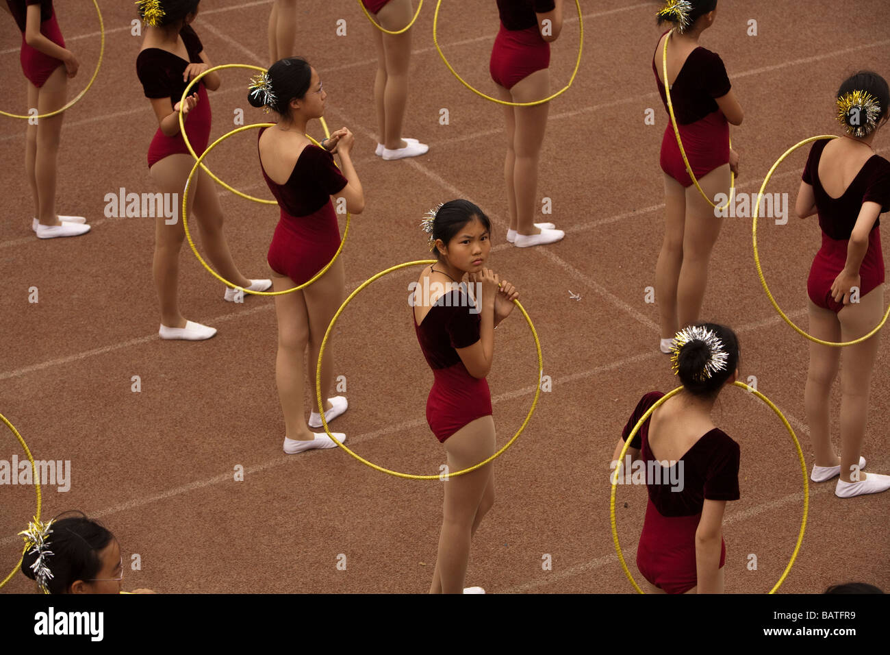 School children at the city sports stadium to rehearse for a parade in ...