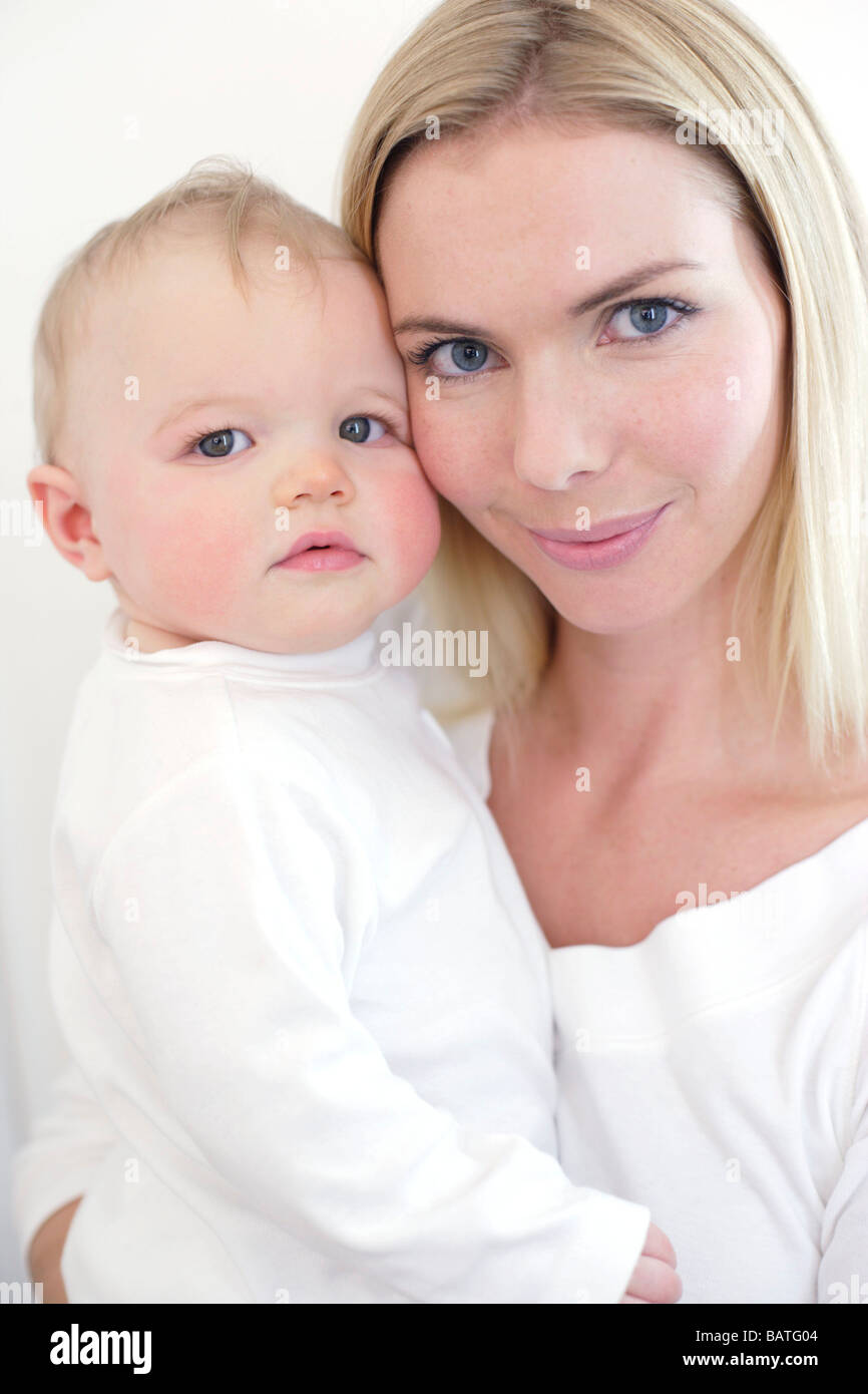 Mother and baby. Mother holding her nine month old baby boy Stock Photo ... Mother and baby. Mother holding her nine month old baby boy Stock Photo ...