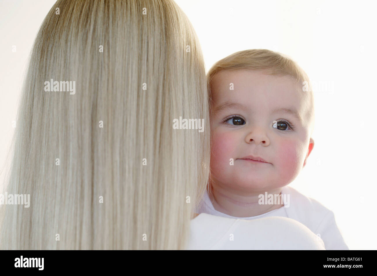 Mother and baby. Mother holding her nine month old baby boy Stock Photo ... Mother and baby. Mother holding her nine month old baby boy Stock Photo ...