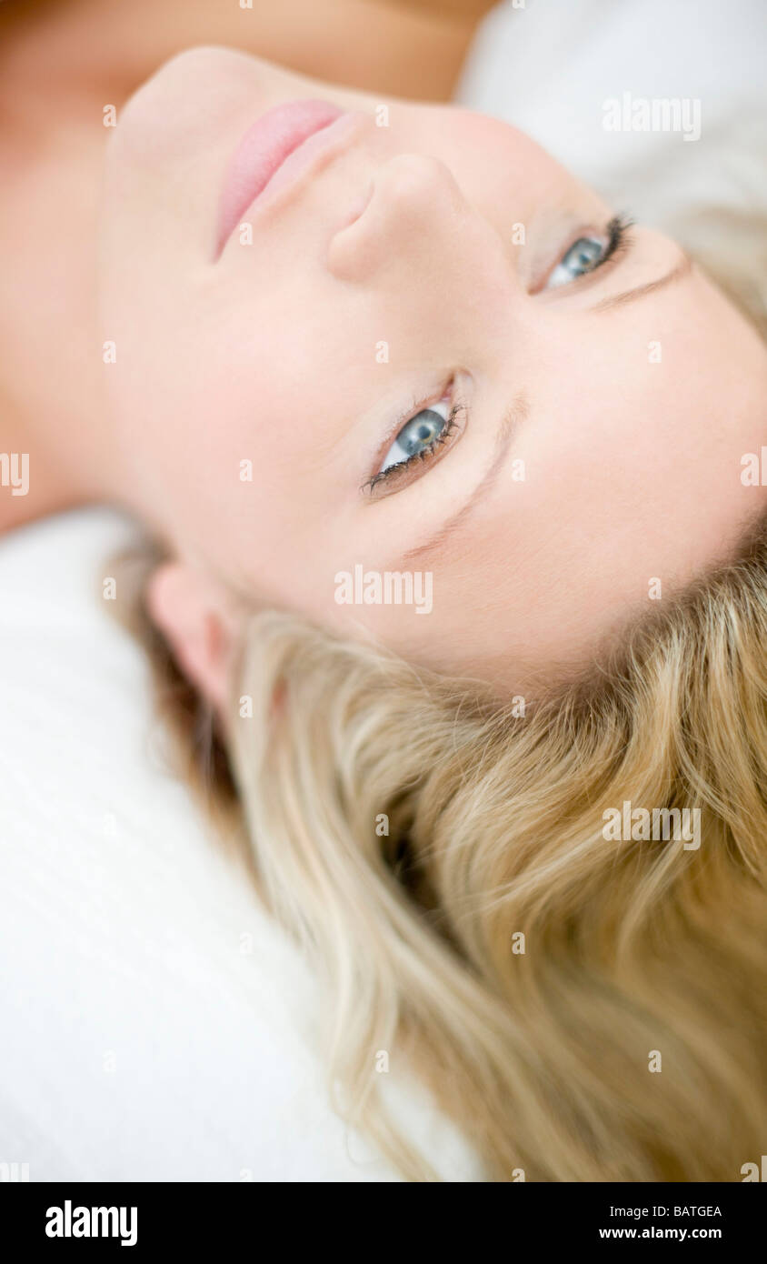 Young woman relaxing Stock Photo - Alamy