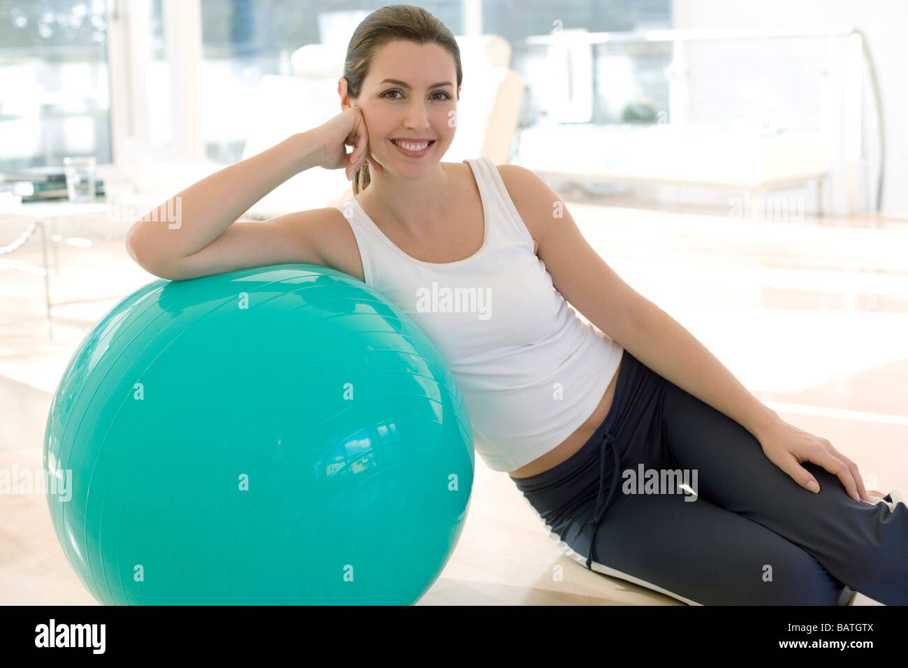 Woman using exercise ball. Theseballs are used when exercising because ...