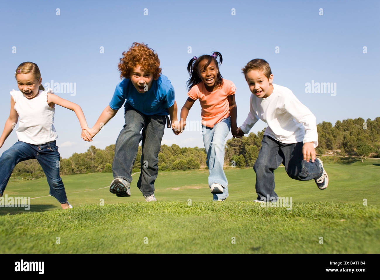 Children playing in a park Stock Photo - Alamy