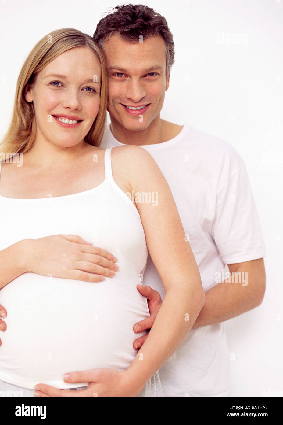 Two pregnant women standing back to back hi-res stock photography and ...