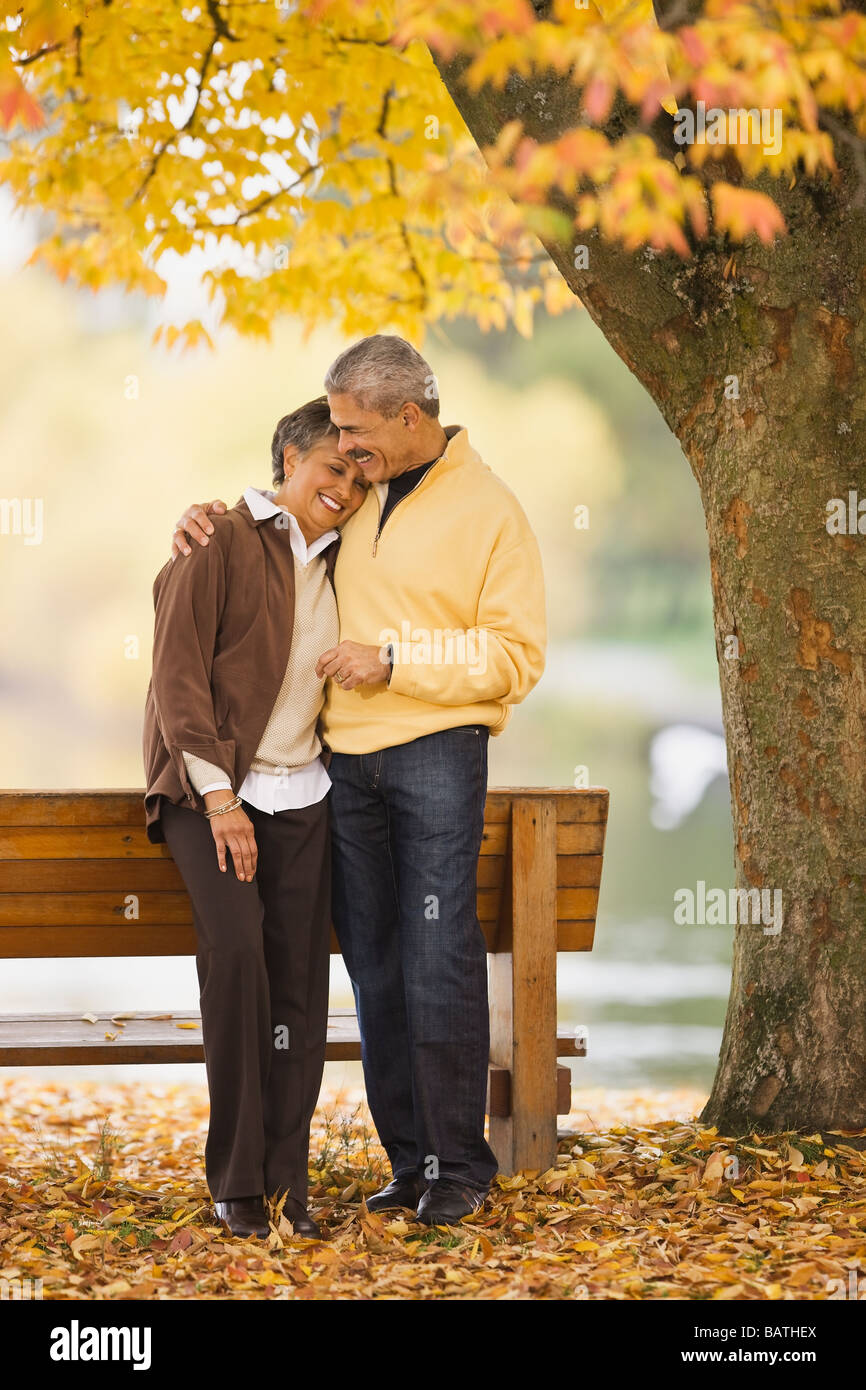 African couple hugging in autumn Stock Photo - Alamy