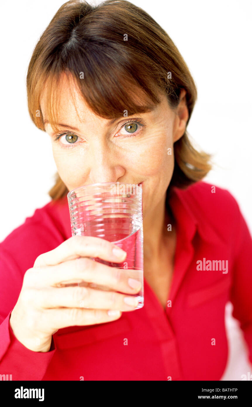 Woman drinking water Stock Photo - Alamy