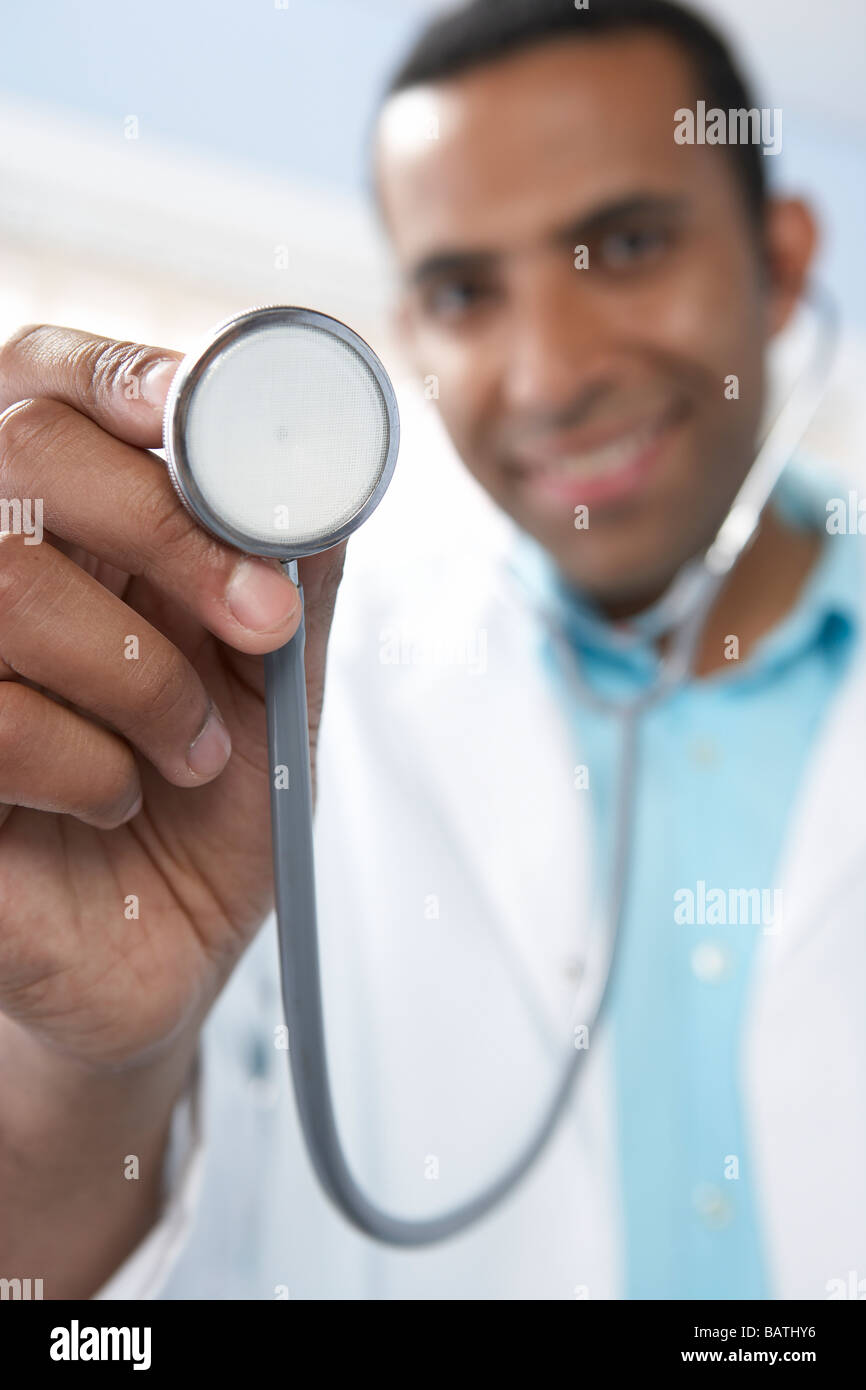 Doctor using a stethoscope.Patient eye-view of a doctor placing the ...