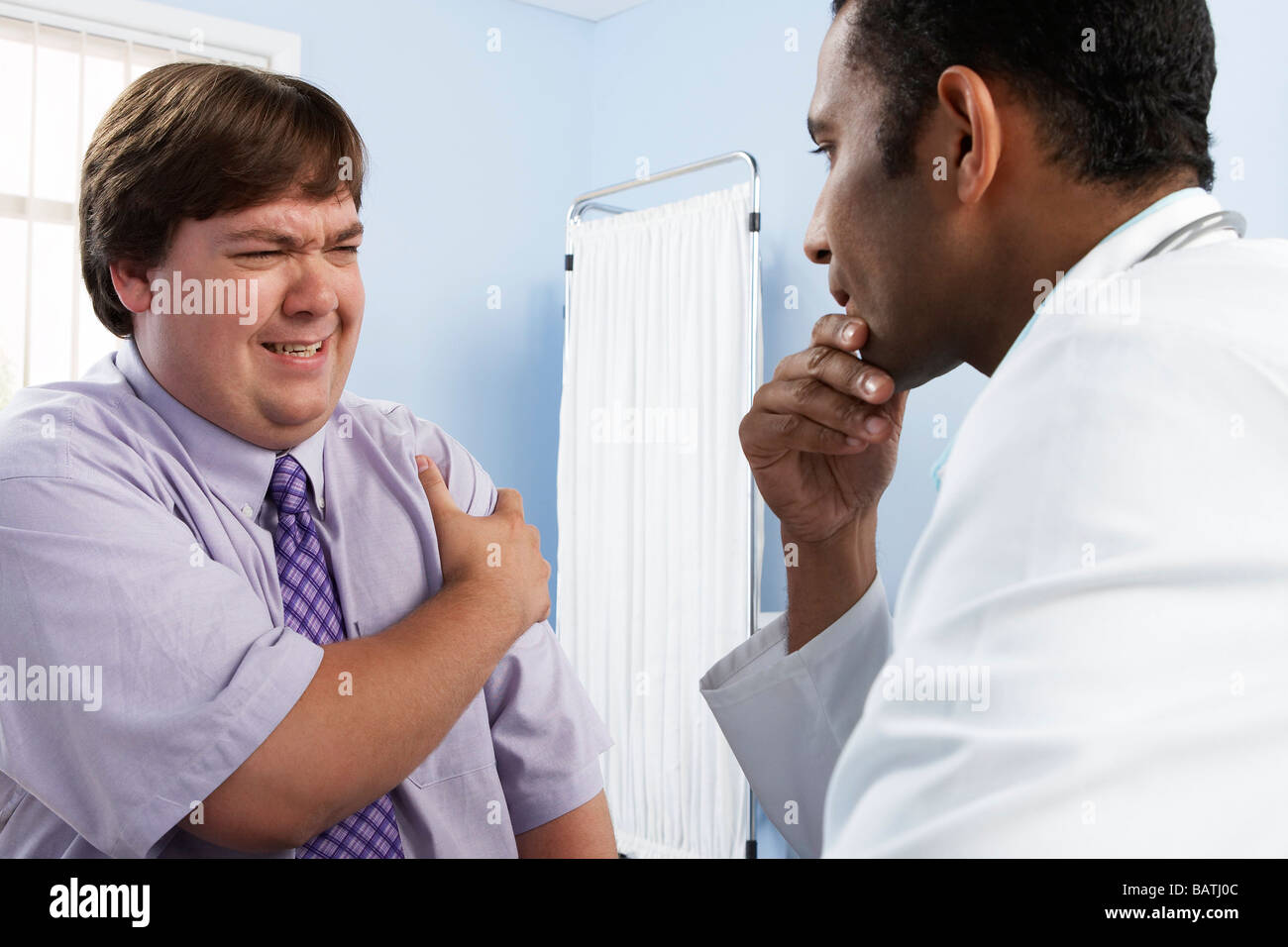 Doctor overweight patient discussion hi-res stock photography and ...