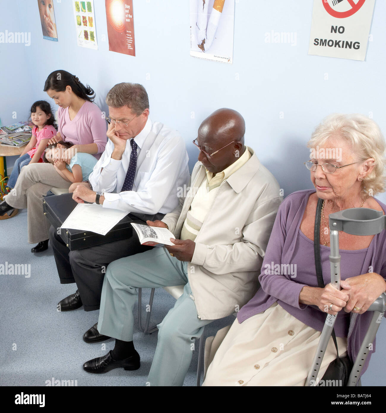 General practice waiting room filled with patients Stock Photo - Alamy