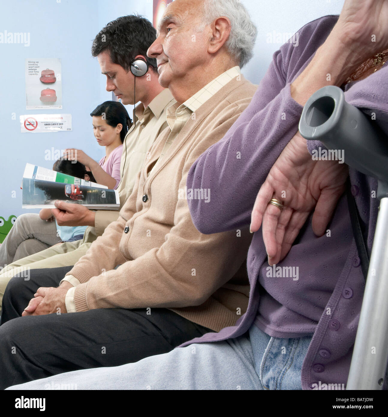 General practice waiting room filled with patients Stock Photo - Alamy