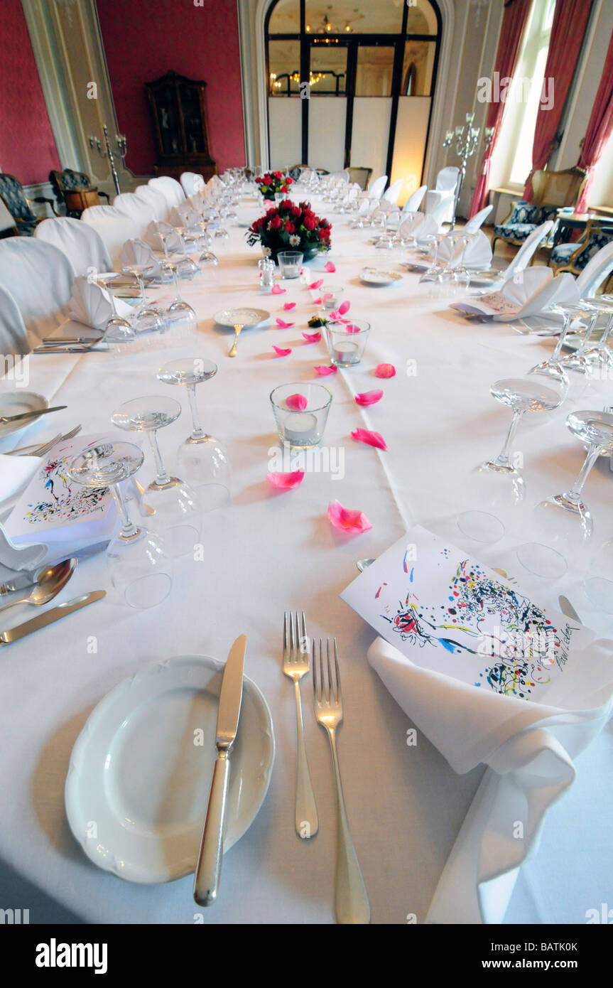 A table prepared for a large banquet in a luxury hotel in Switzerland ...