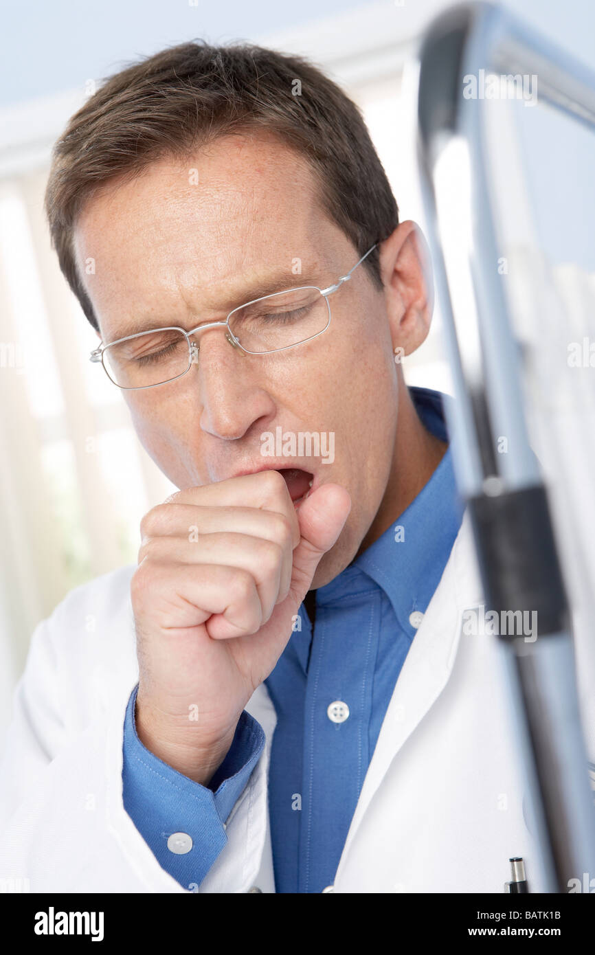 Doctor working long hours hi-res stock photography and images - Alamy