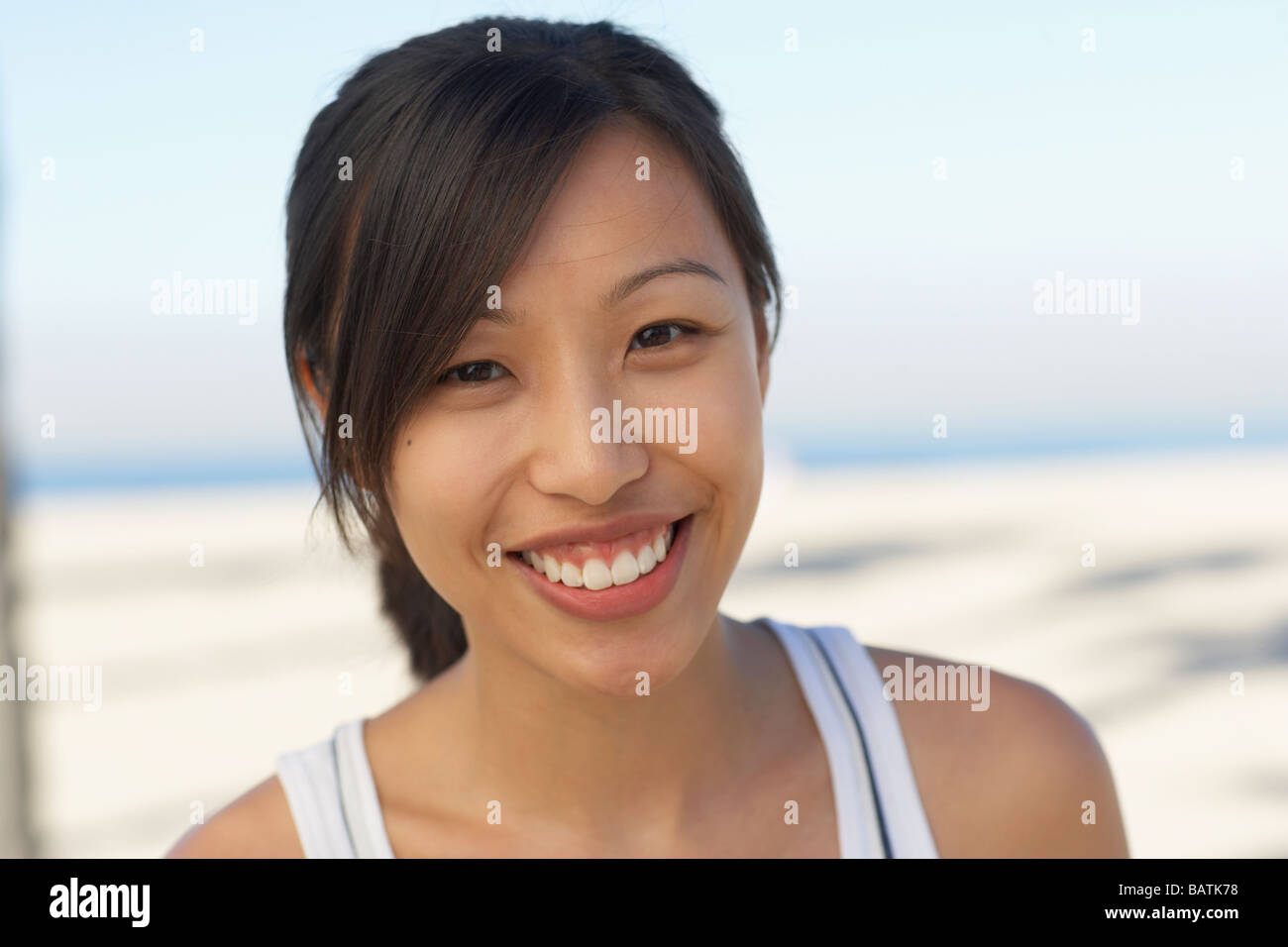 Asian woman smiling Stock Photo - Alamy