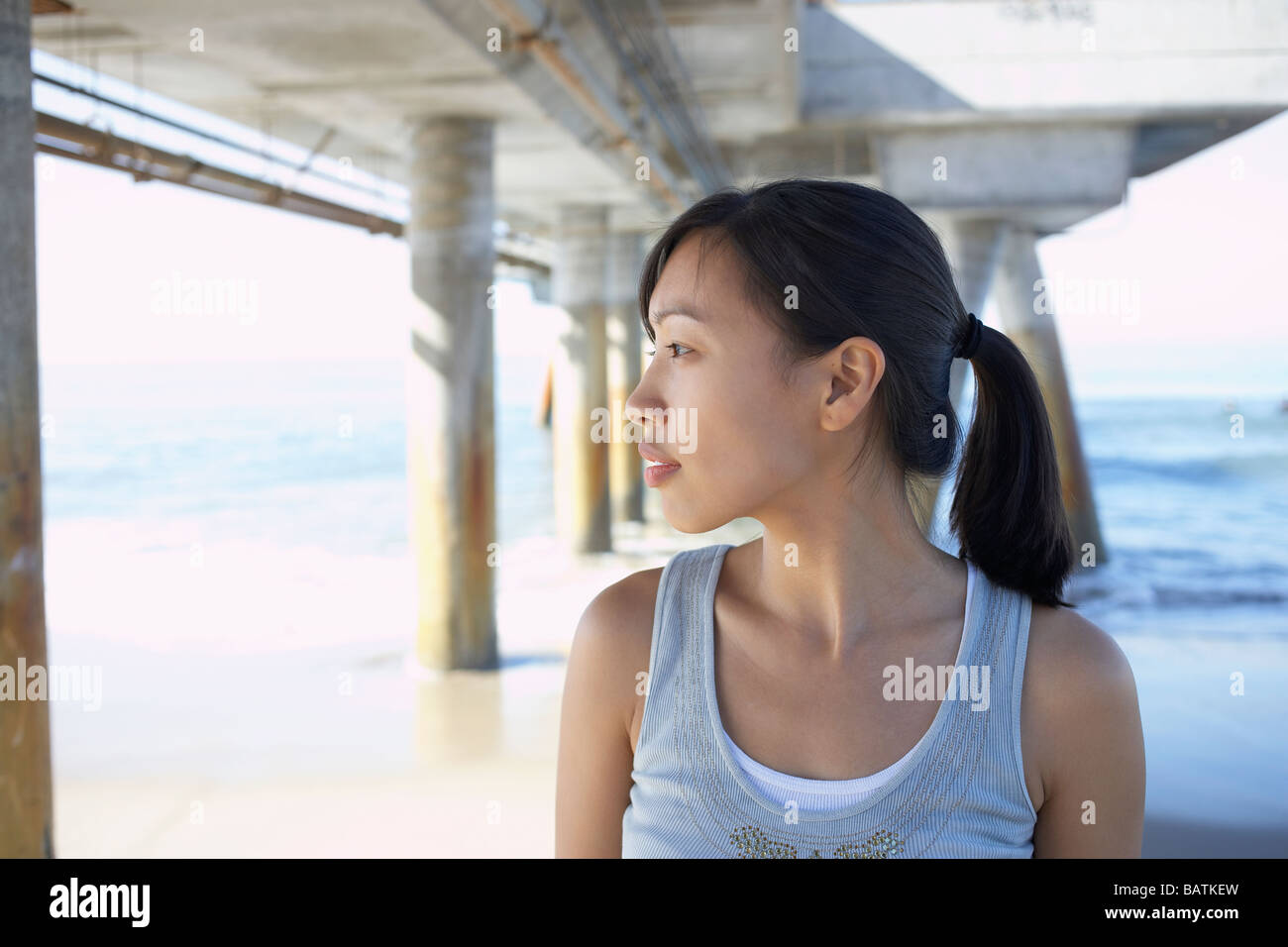 Young woman under pier hi-res stock photography and images - Alamy