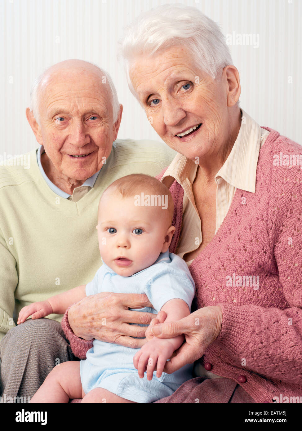 Affectionate grandparents infant hi-res stock photography and images ...