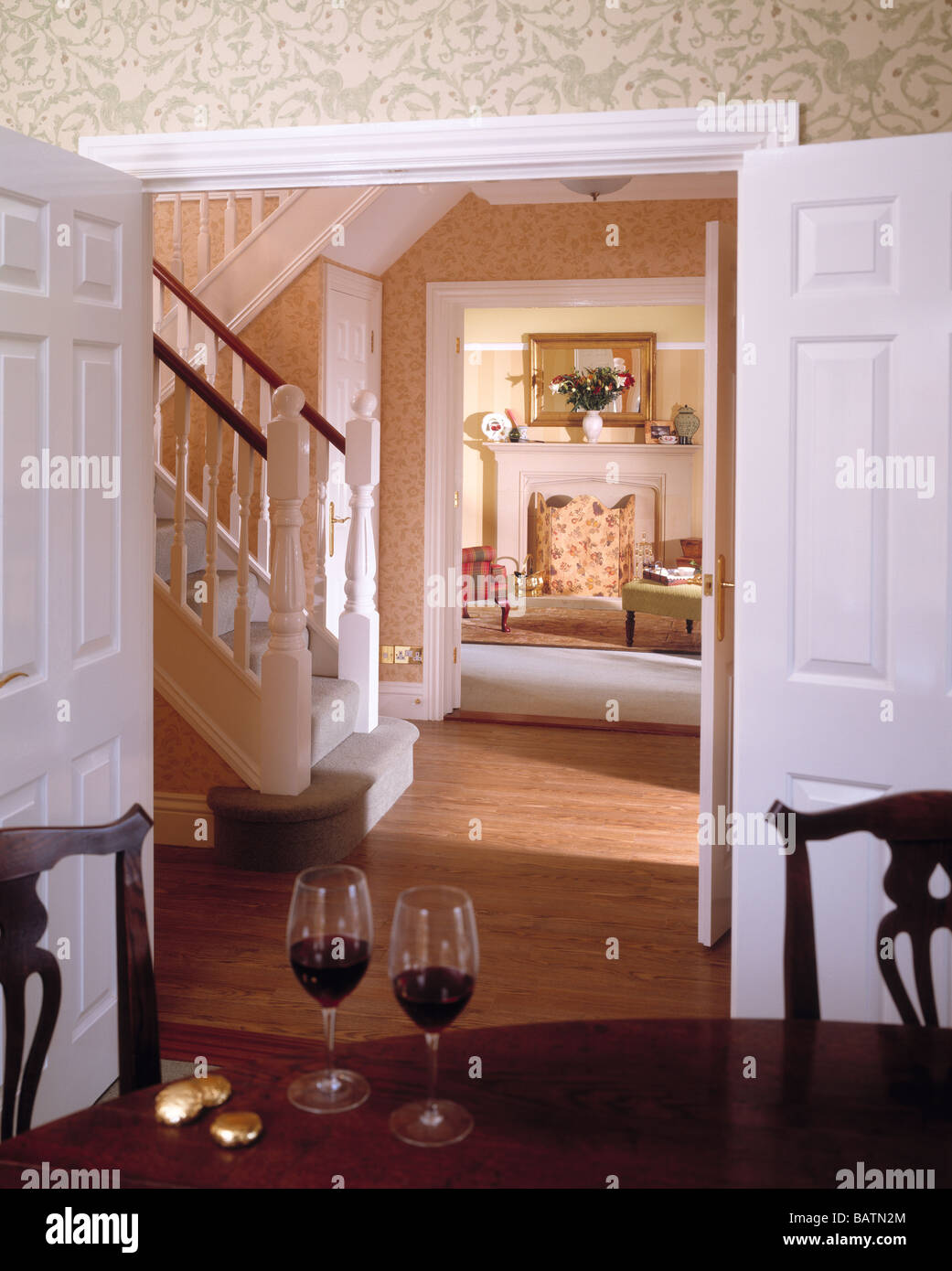 An englishmans home formal hallway shot and lounge Stock Photo - Alamy