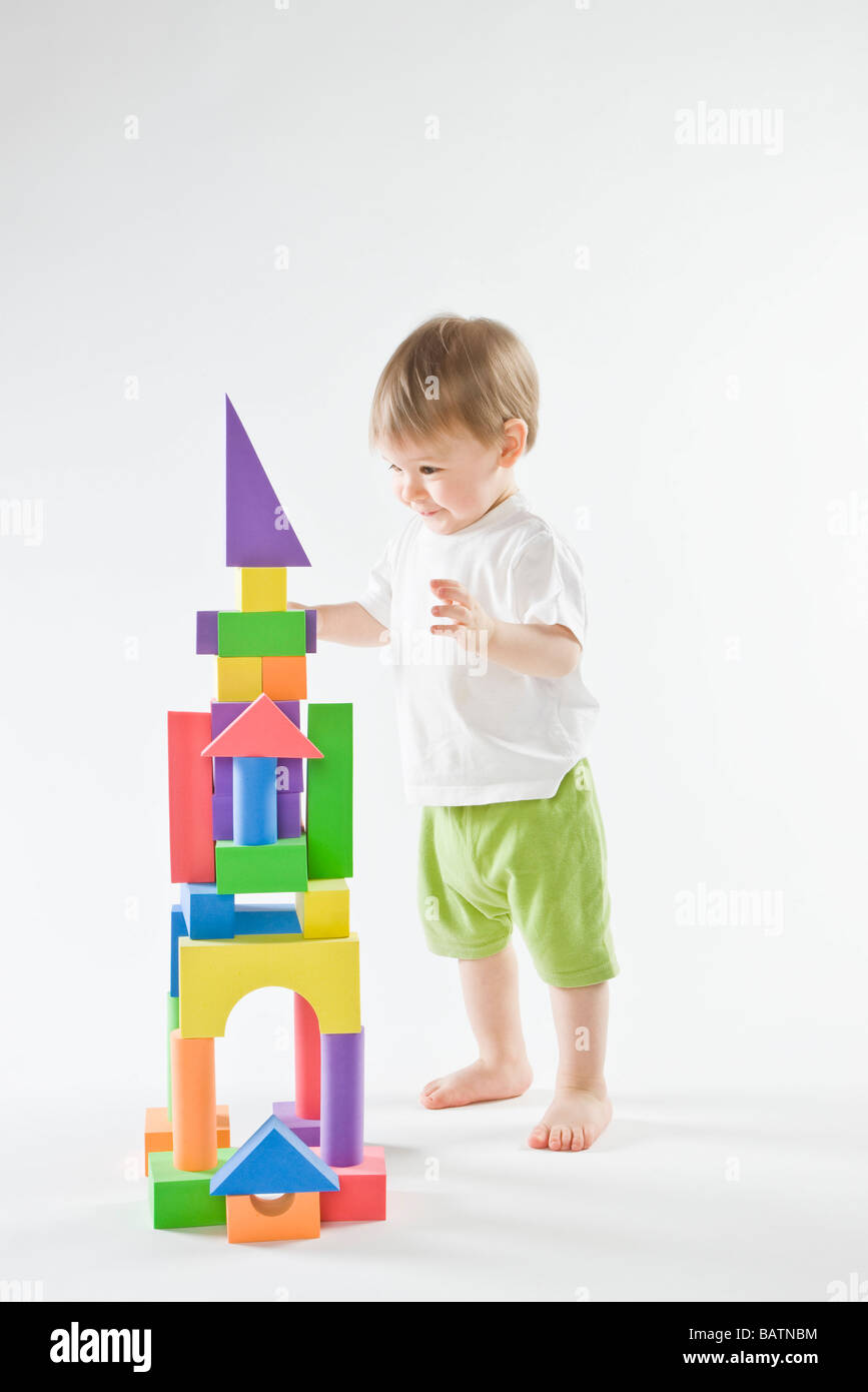 baby boy building man from color blocks Stock Photo - Alamy