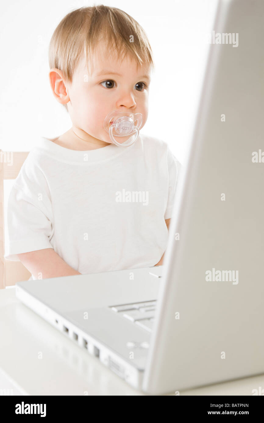 baby boy using notebook Stock Photo - Alamy