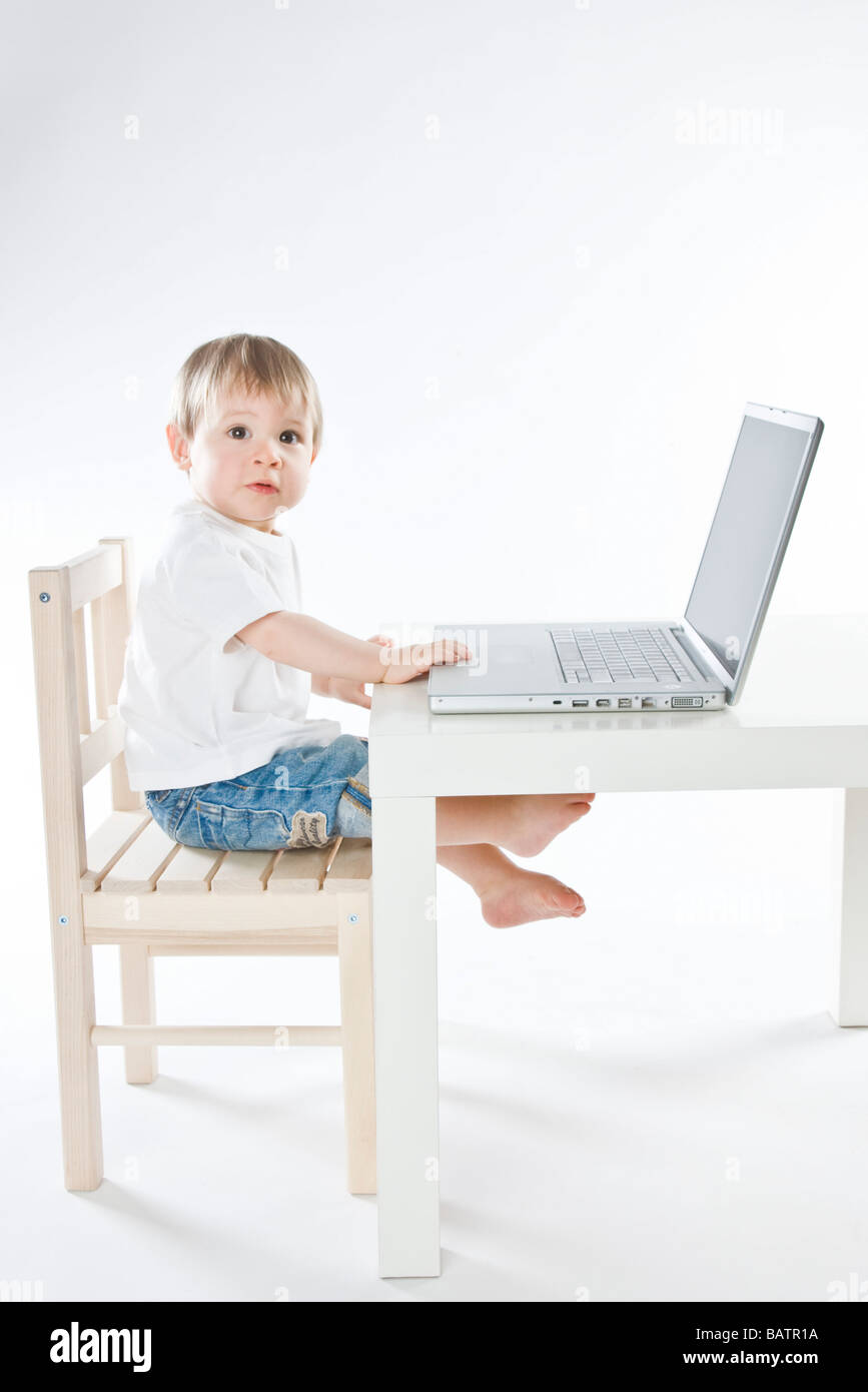 baby boy using computer Stock Photo - Alamy