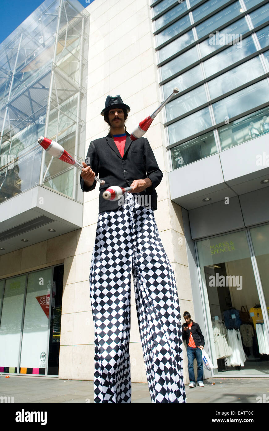 Performance stilt walkers in hi-res stock photography and images - Alamy