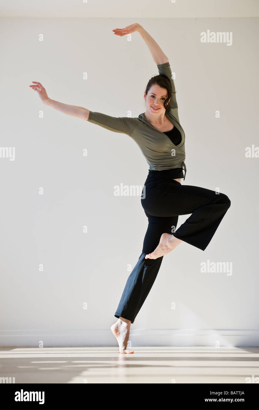 Female ballet dancer jumping, studio shot Stock Photo - Alamy
