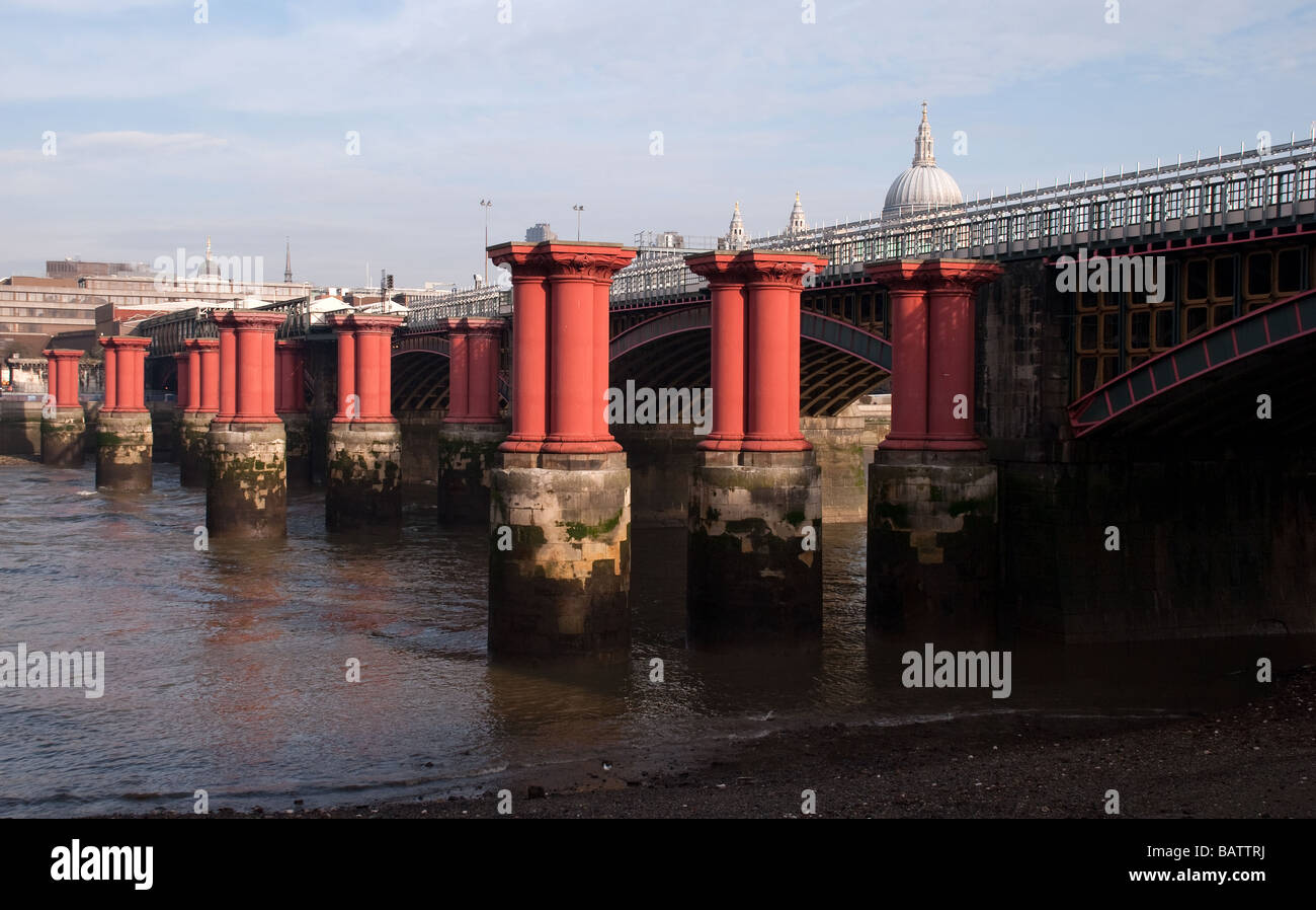 Blackfriars Railway Bridge with the Pillars of the Old Bridge across ...