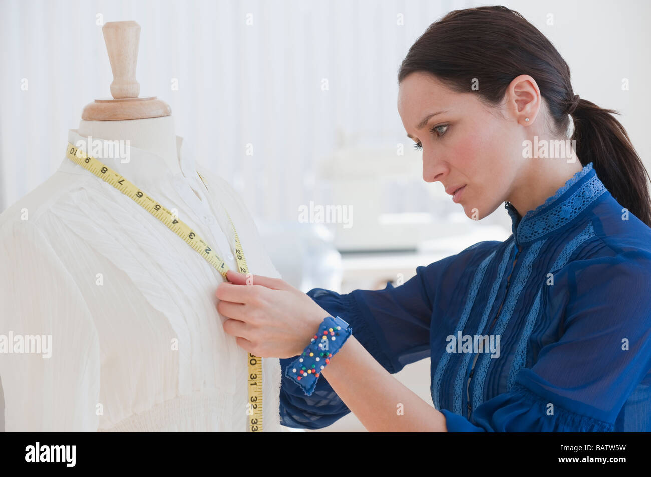 Tailor measuring head hi-res stock photography and images - Alamy
