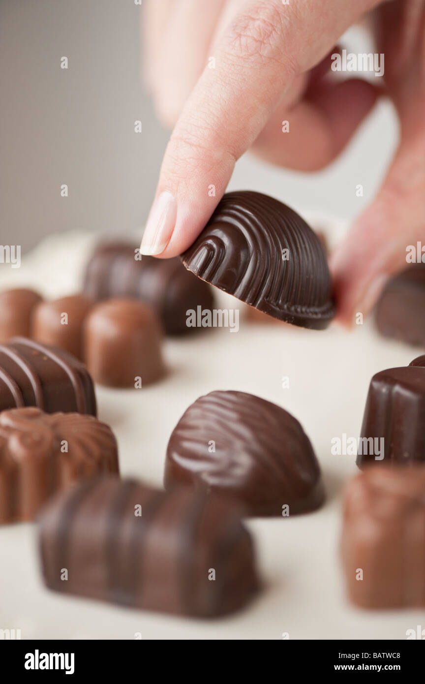 Hand chocolate hi-res stock photography and images - Alamy