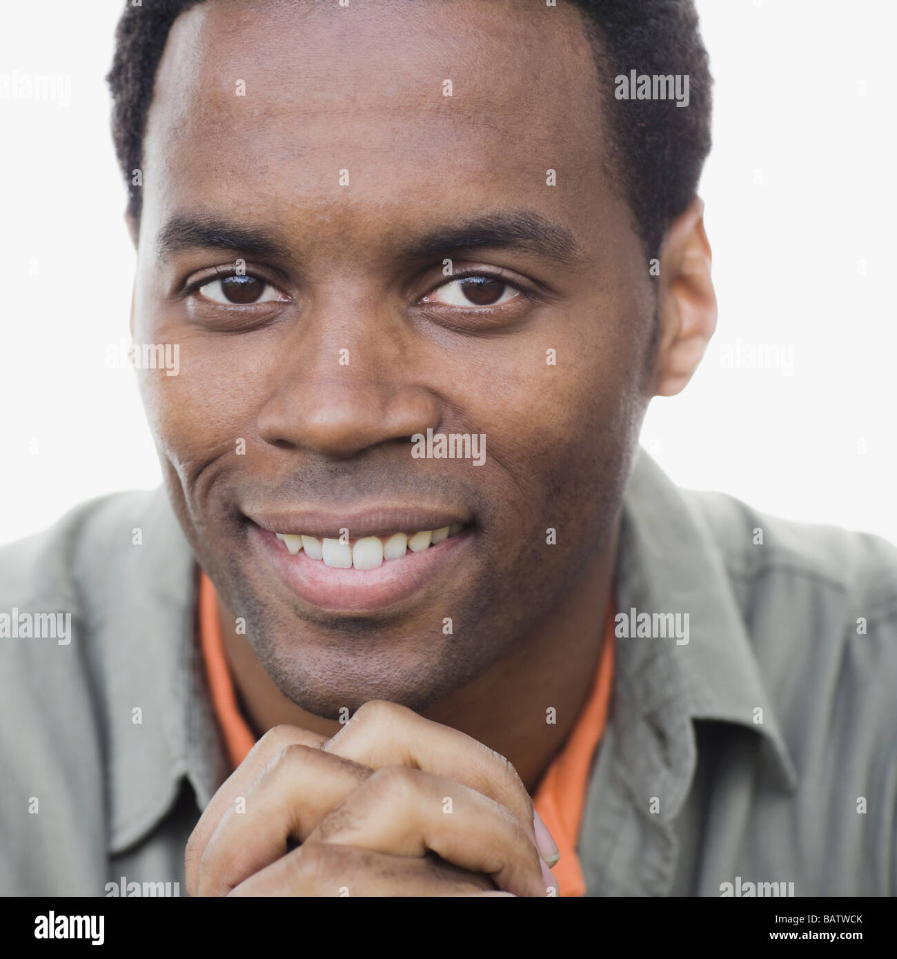 Studio portrait of man smiling Stock Photo - Alamy