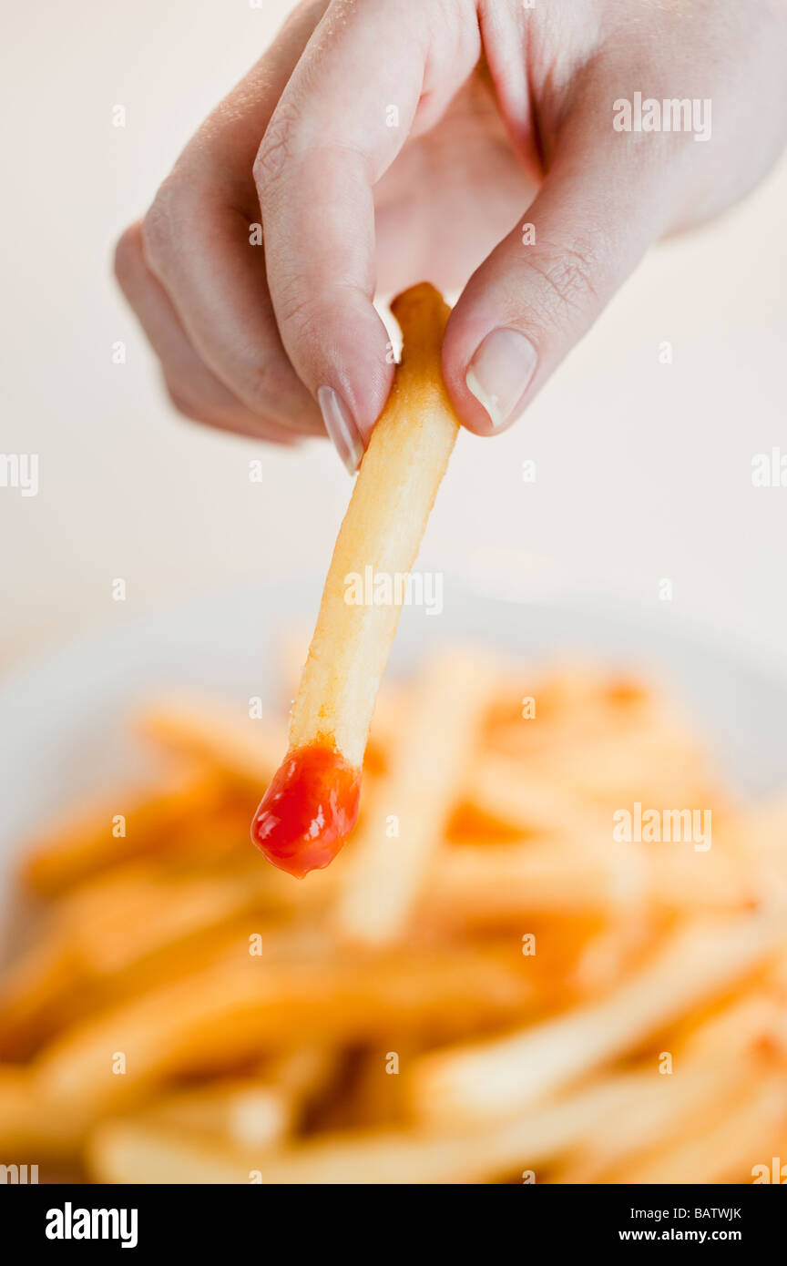 Woman french fries hi-res stock photography and images - Alamy