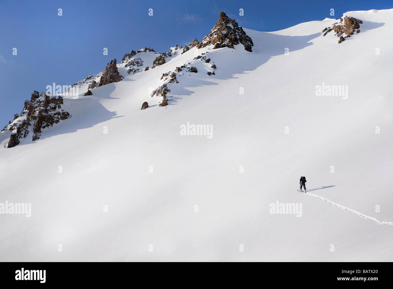 USA, Colorado, Aspen, Person walking in snow up mountain Stock Photo ...