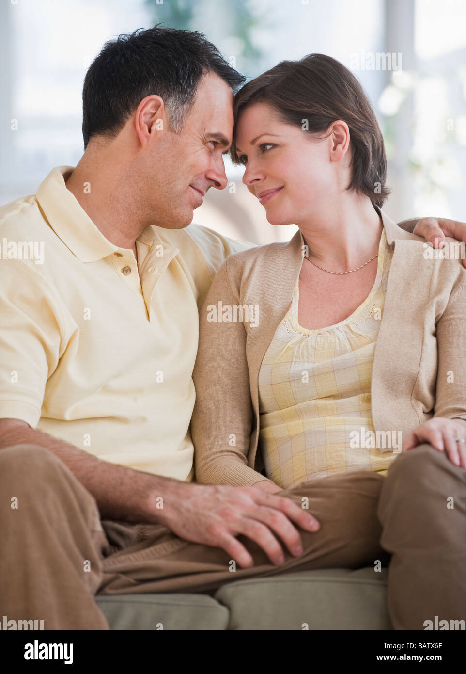 Couple looking in eyes Stock Photo - Alamy
