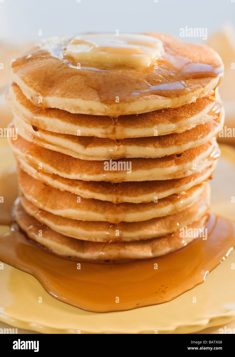 Stack of pancakes with syrup Stock Photo - Alamy