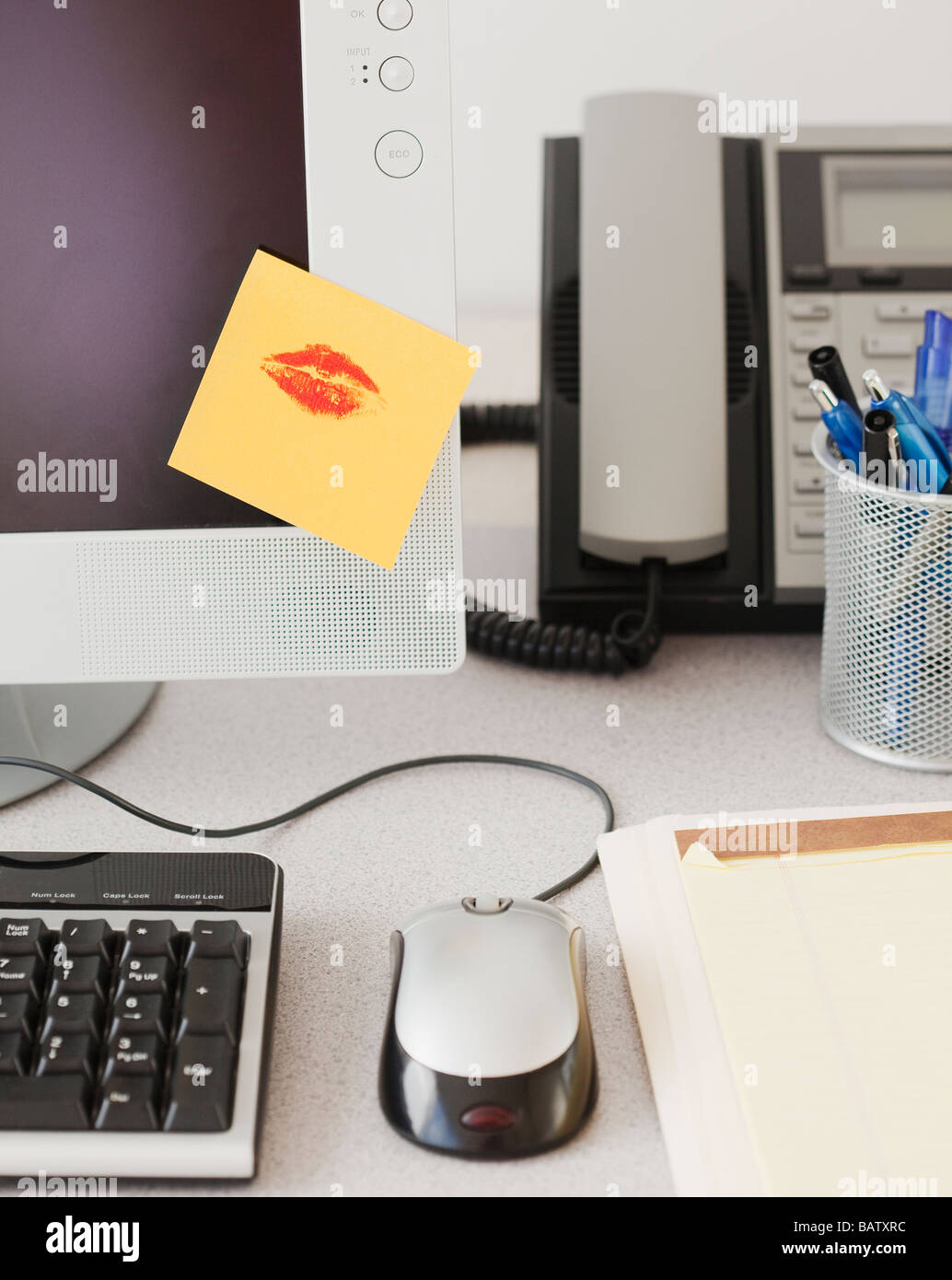 Adhesive note with lipstick kiss on computer monitor Stock Photo - Alamy