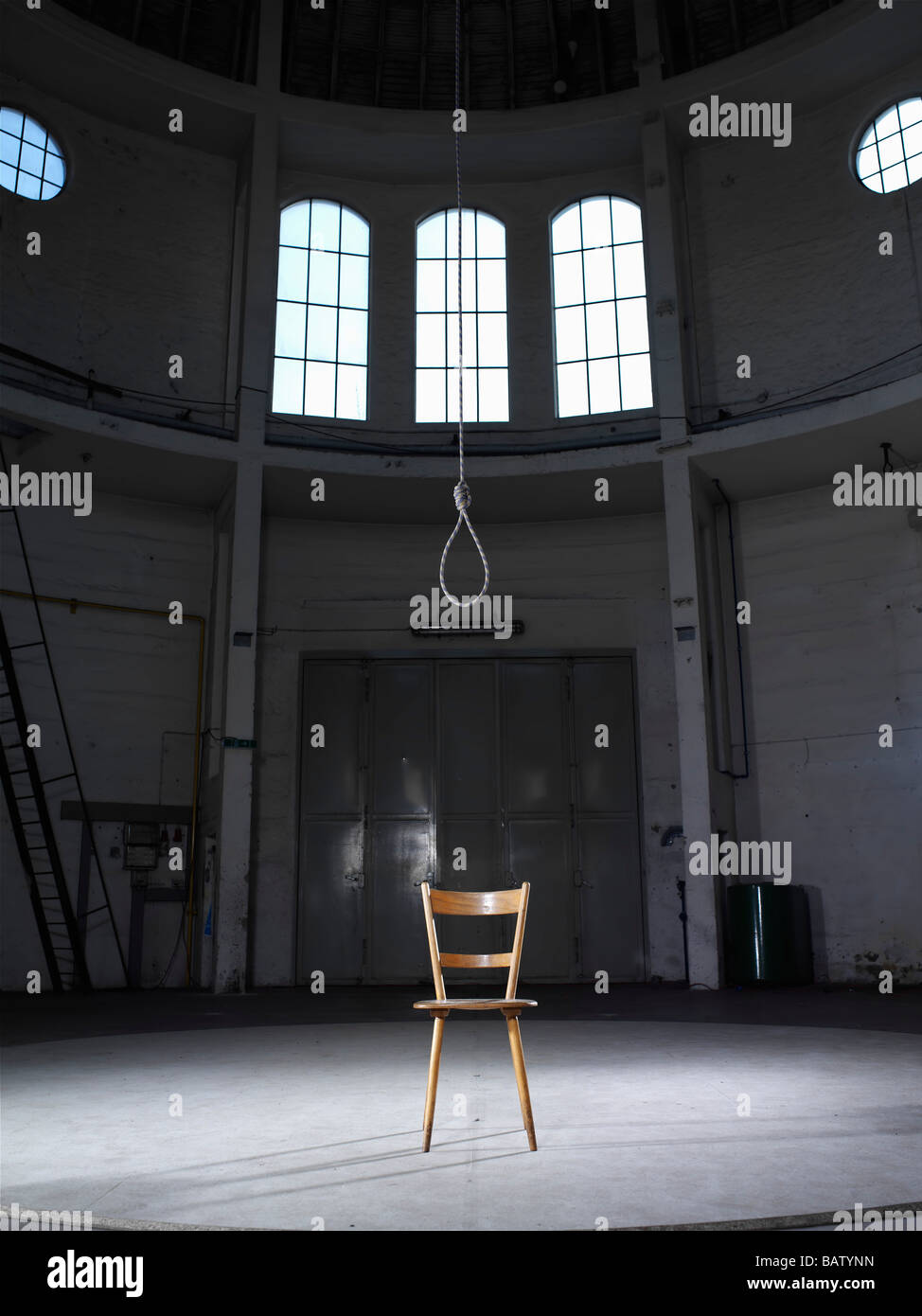 still life of chair and rope in empty building Stock Photo - Alamy