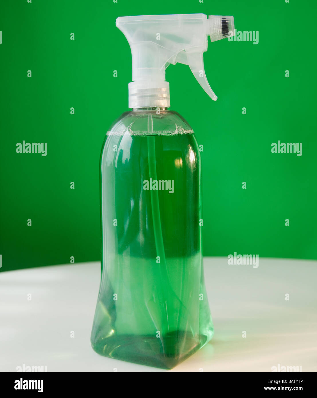 Green liquid spray bottle Stock Photo - Alamy