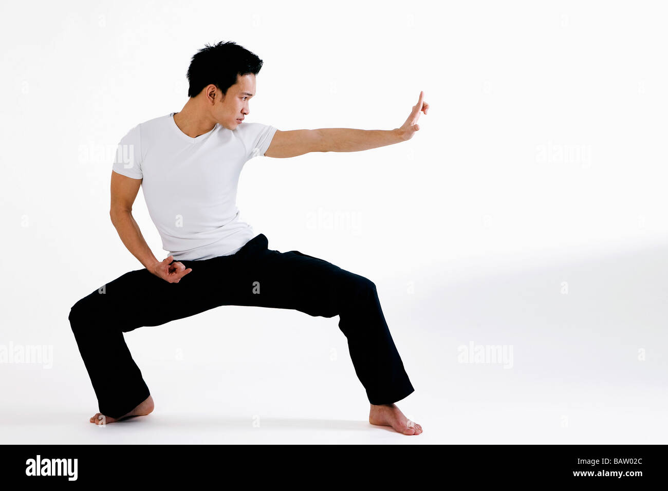 asian man doing martial arts exercises Stock Photo - Alamy