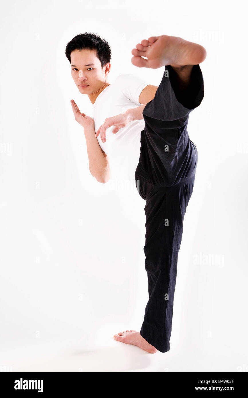portrait of asian man doing martial arts Stock Photo - Alamy