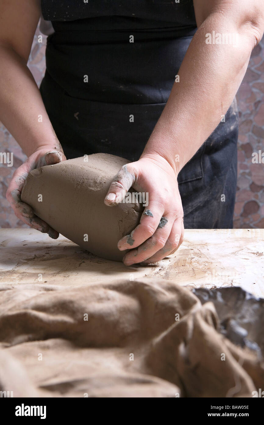 detail of potter forming piece of clay Stock Photo - Alamy