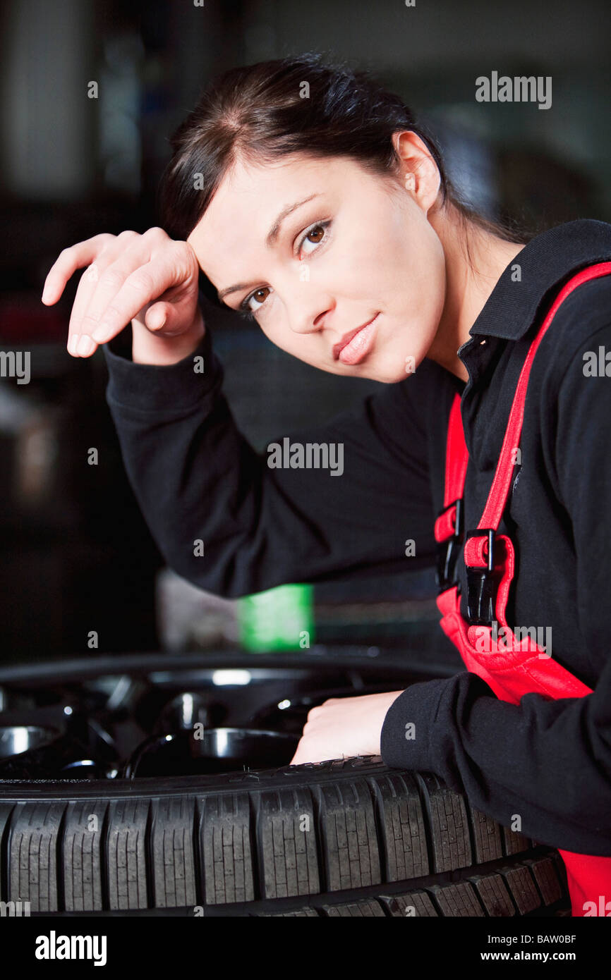 portrait of exhausted female mechanic Stock Photo - Alamy