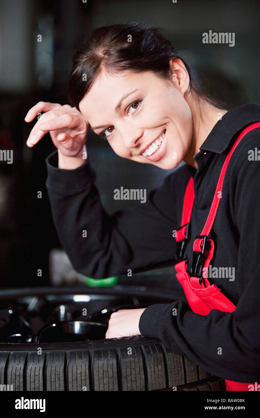 portrait of exhausted female mechanic Stock Photo - Alamy