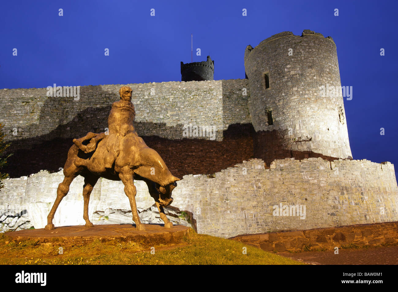 Town of Harlech, Wales. Night floodlit view of the Ivor Roberts-Jones ...
