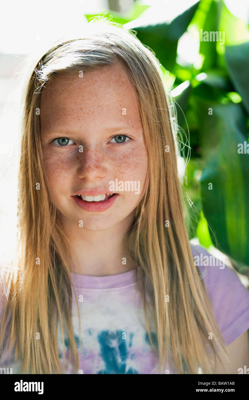 Portrait of smiling girl (10-11 Stock Photo - Alamy