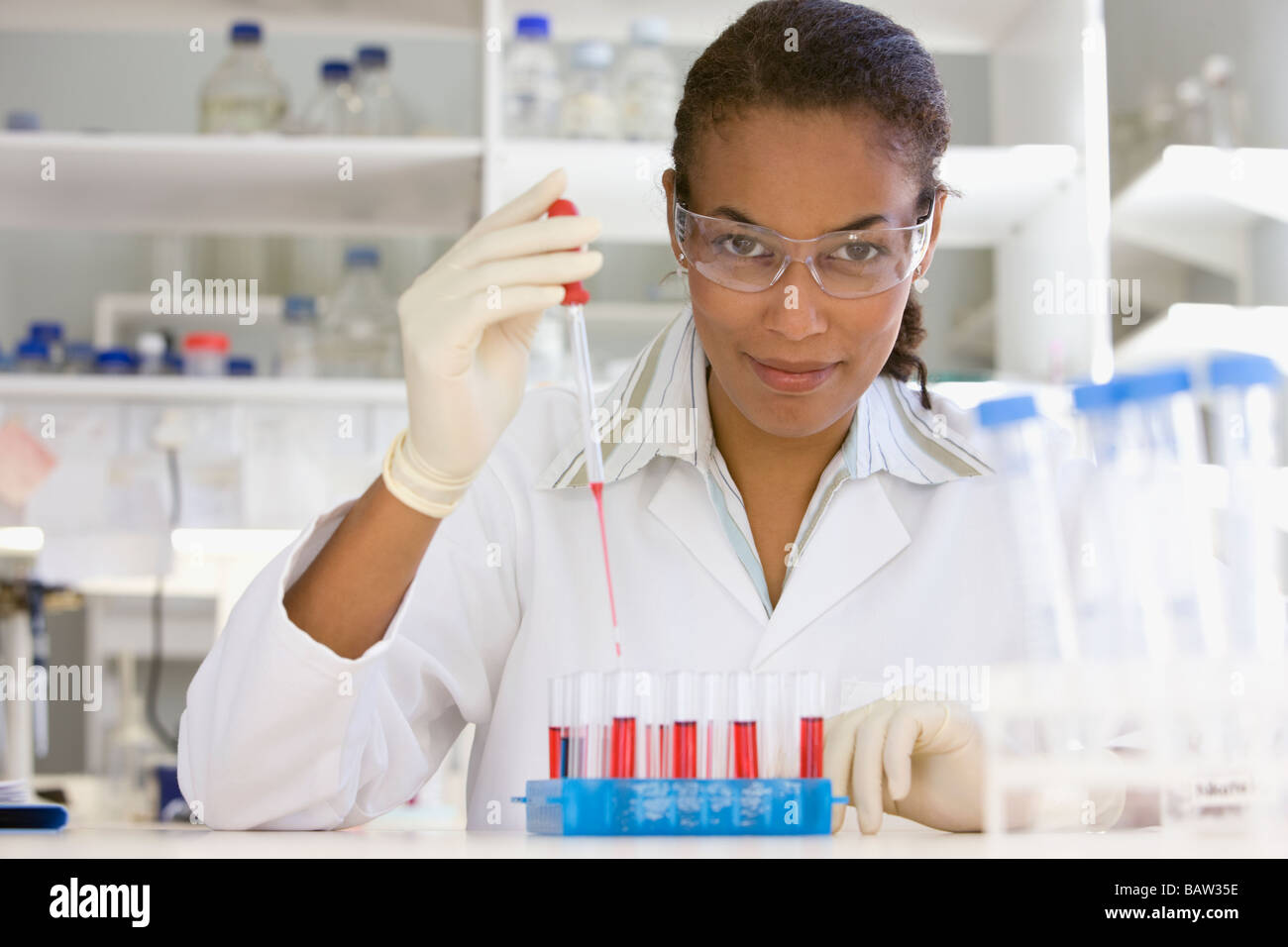African scientist performing analysis in laboratory Stock Photo - Alamy