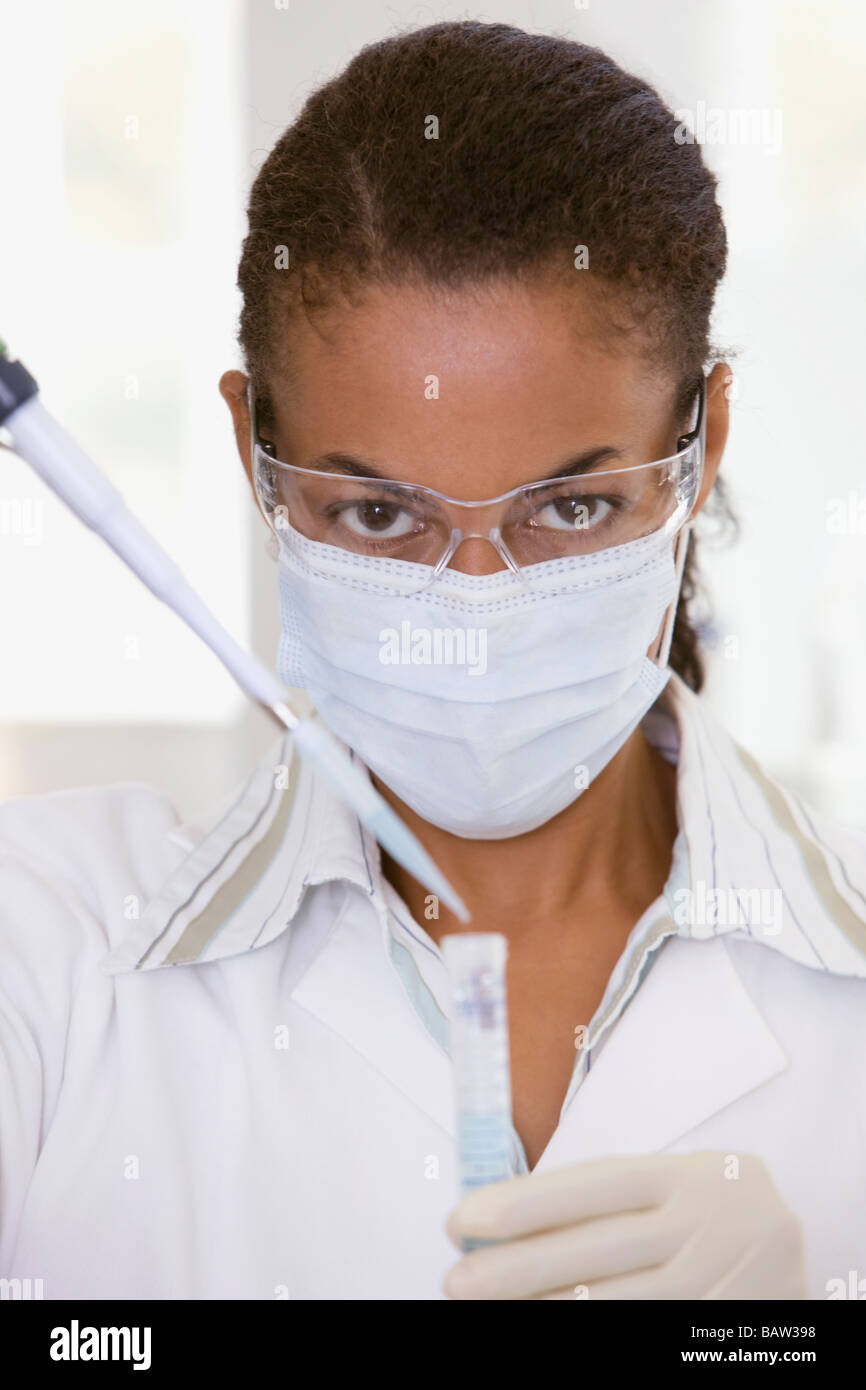 African scientist performing analysis in laboratory Stock Photo - Alamy