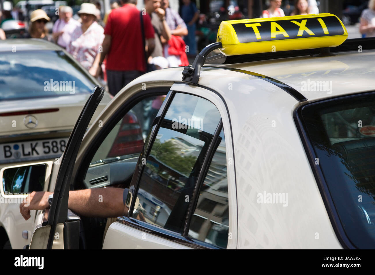 Berlin taxi driver on a satnd waitin Stock Photo - Alamy