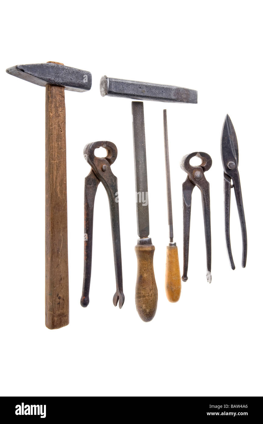 object on white instrument and hammer close up Stock Photo - Alamy