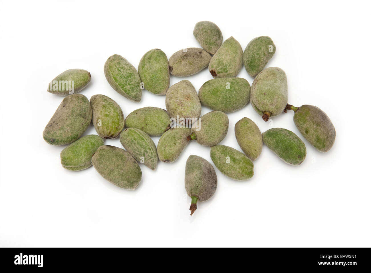 Fresh green almonds isolated on a white studio background Stock Photo ...