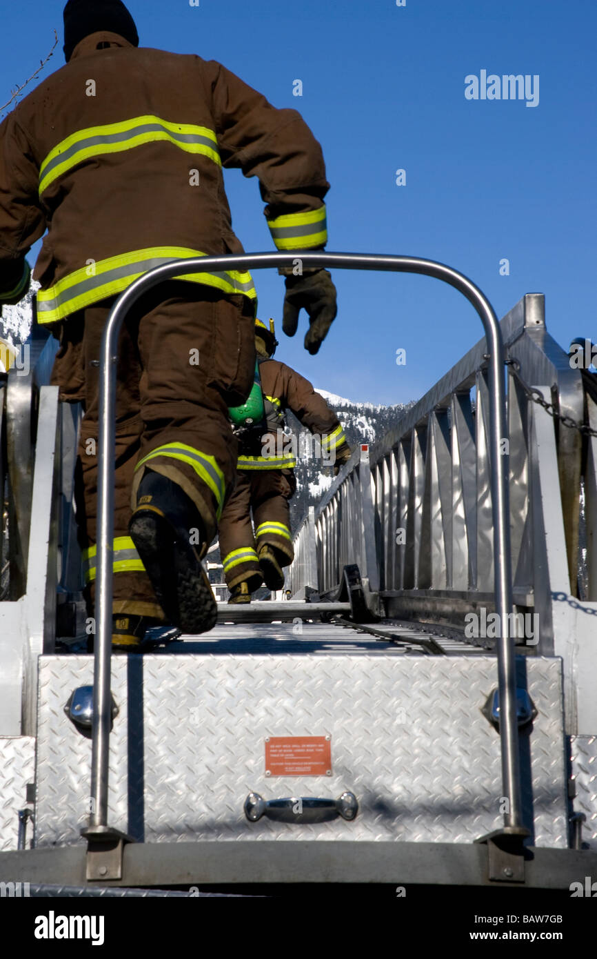 Fireman run ladder reflective hi-res stock photography and images - Alamy