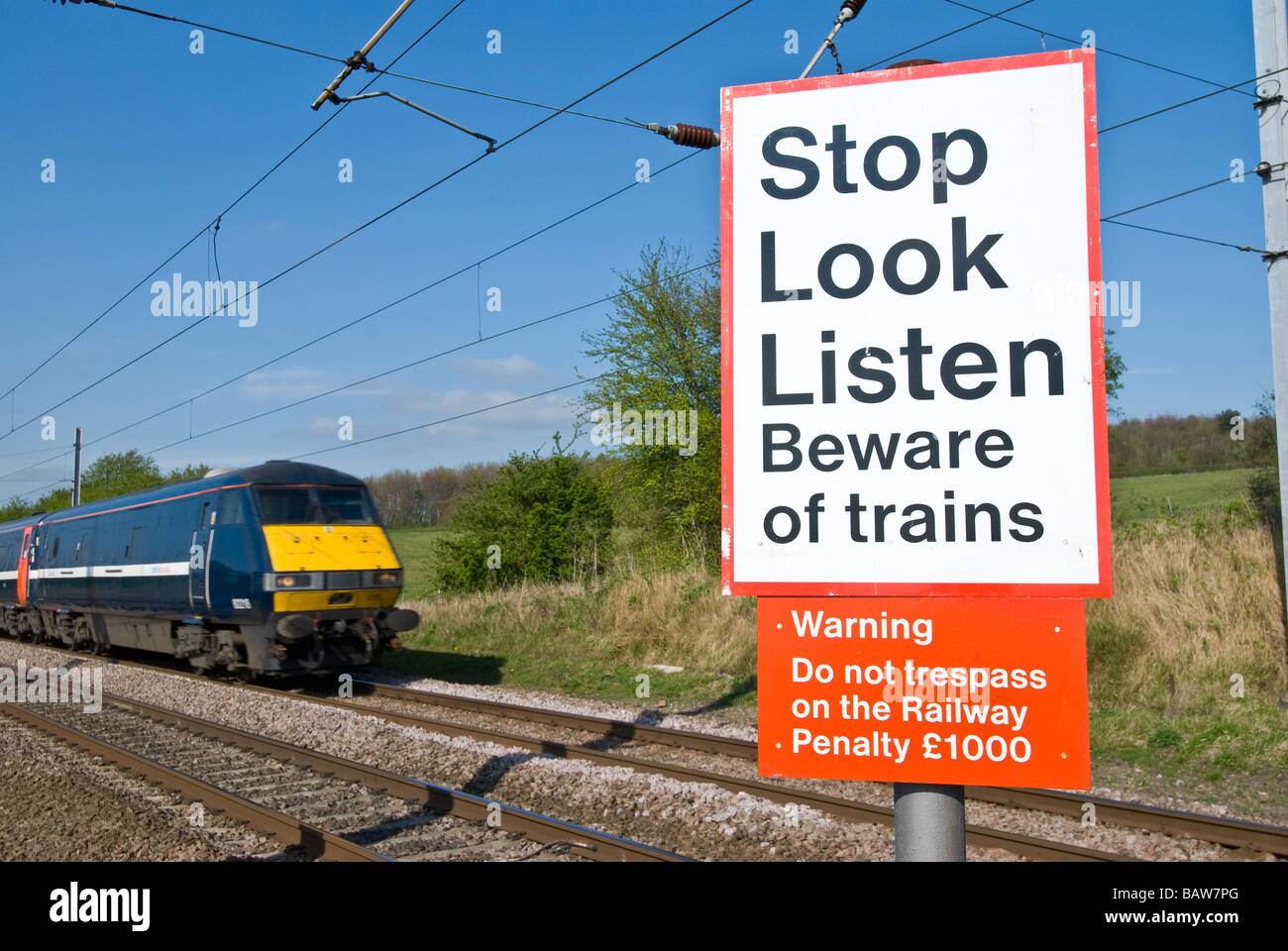 Stop, Look & Listen Train coming Stock Photo - Alamy