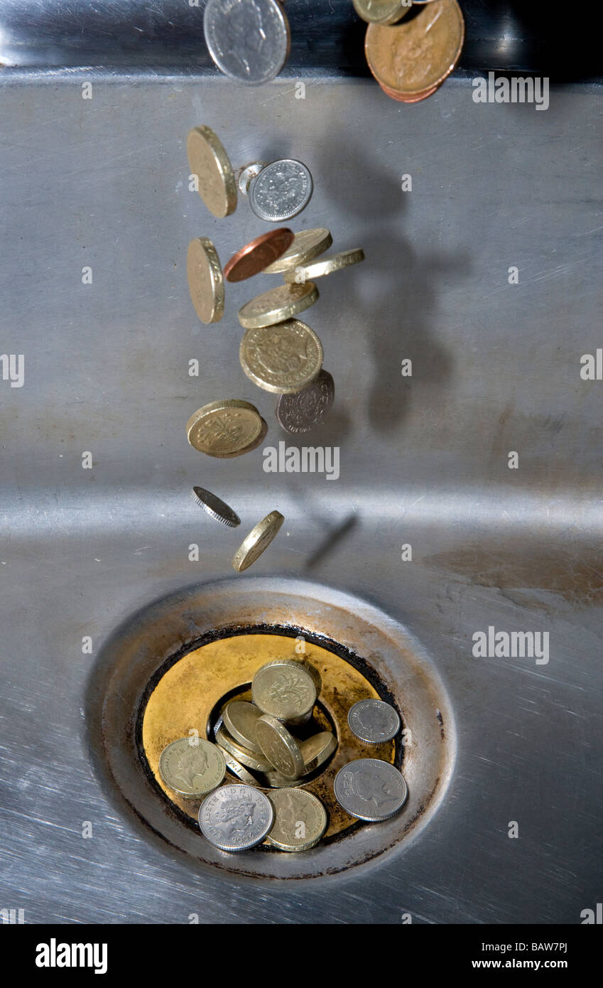 Cash drain hi-res stock photography and images - Alamy